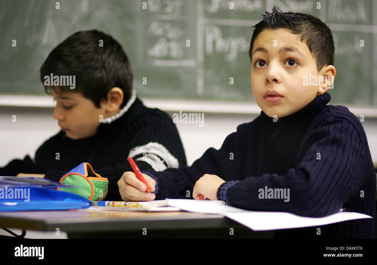 Male muslim fifth grade pupils attend an islamic religion class at the ...