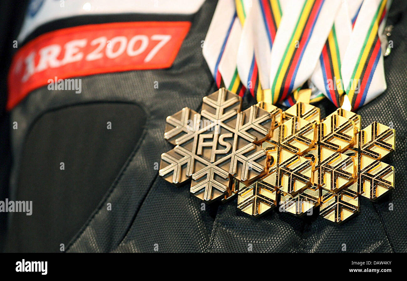 Anja Paerson of Sweden shows her medals during the medal ceremony for ...