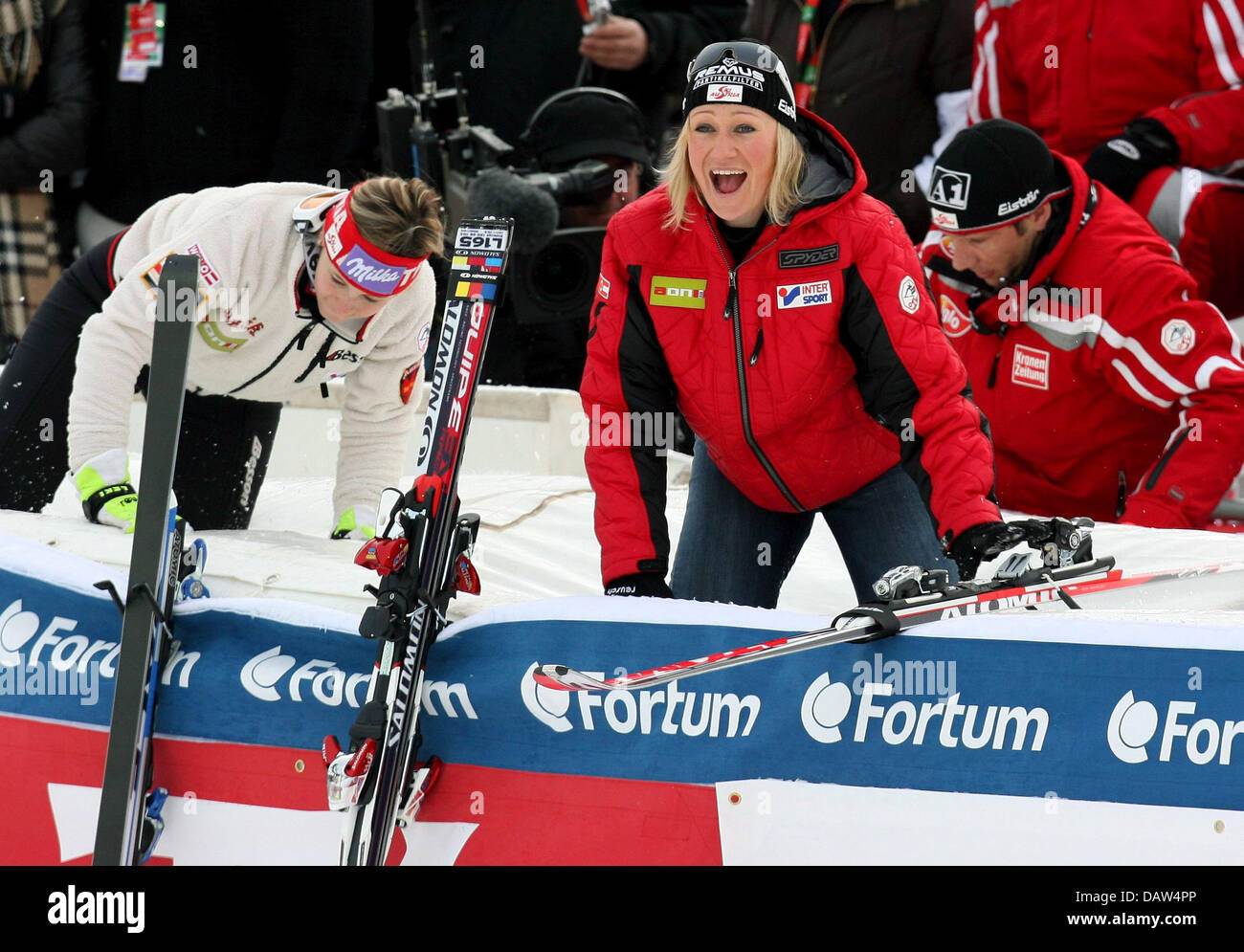 Austrian Michaela Kirchgasser, Renate Goetschl and Fritz Strobel climb ...