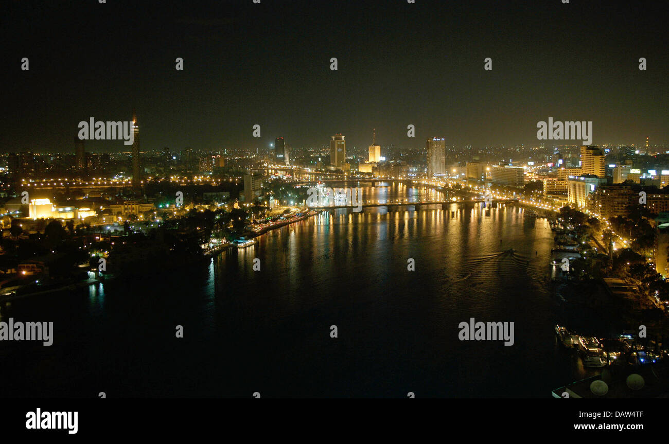 The picture shows a night view onto the Nile river and the centre of ...