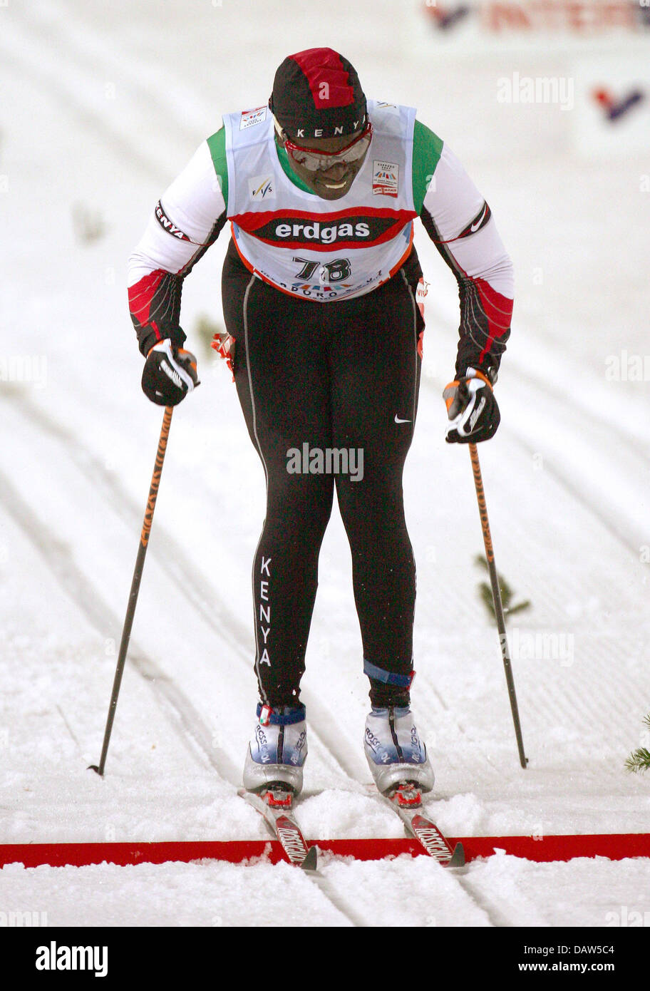 Kenyan Nordic combined athlete Philip Boit arrives at the finish line ...