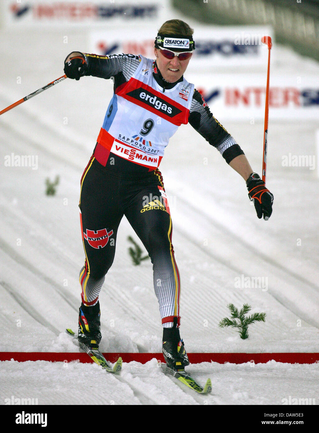 German Nordic combined athlete Viola Bauer arrives at the finish line ...