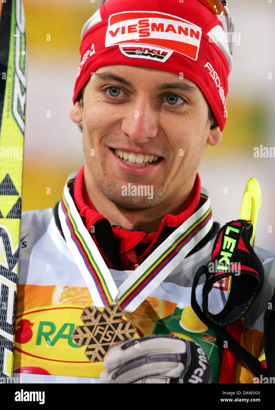 German Bjoern Kircheisen shows his bronce medal after the Nordic ...