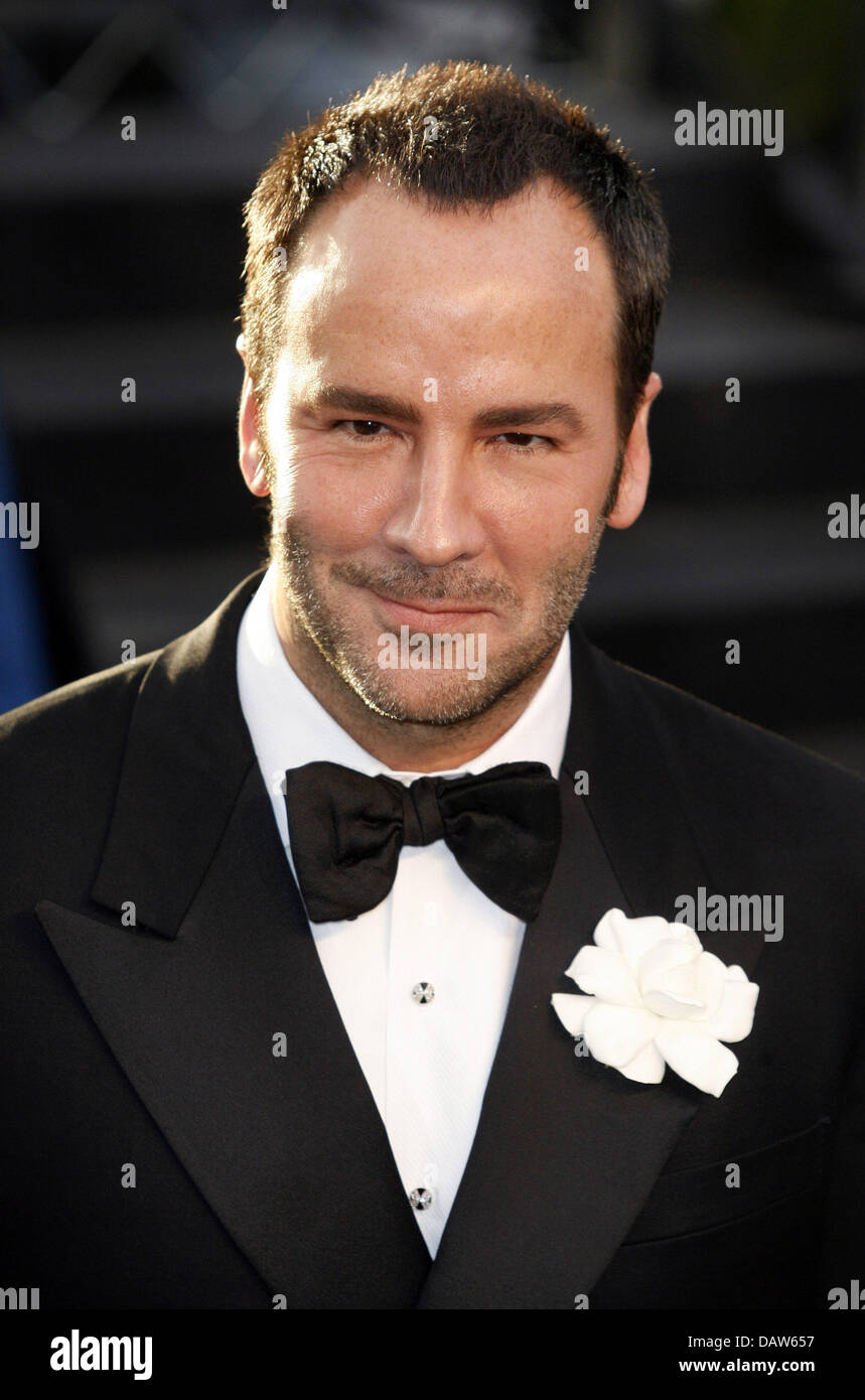 US fashion designer Tom Ford smiles for the cameras arriving at the ...
