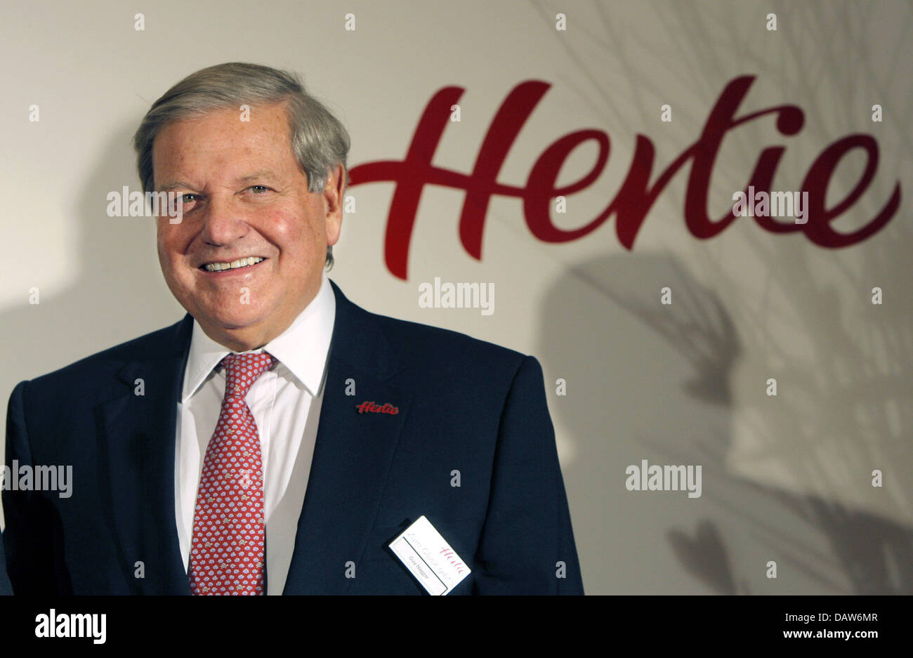 British Investor Guy Naggar poses in front of the new Hertie logo in ...