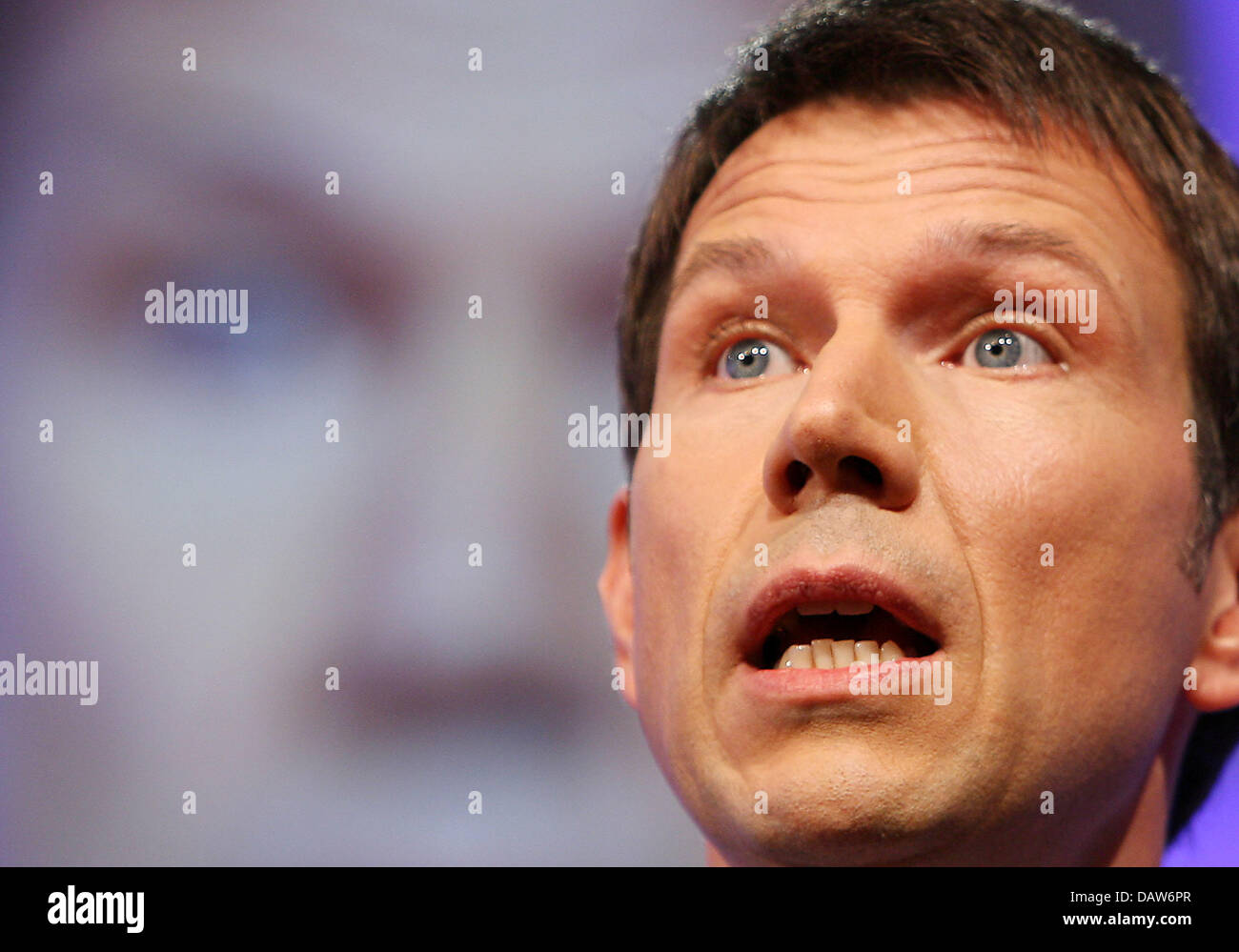 German Telekom CEO Rene Obermann explains the figures at the company's ...