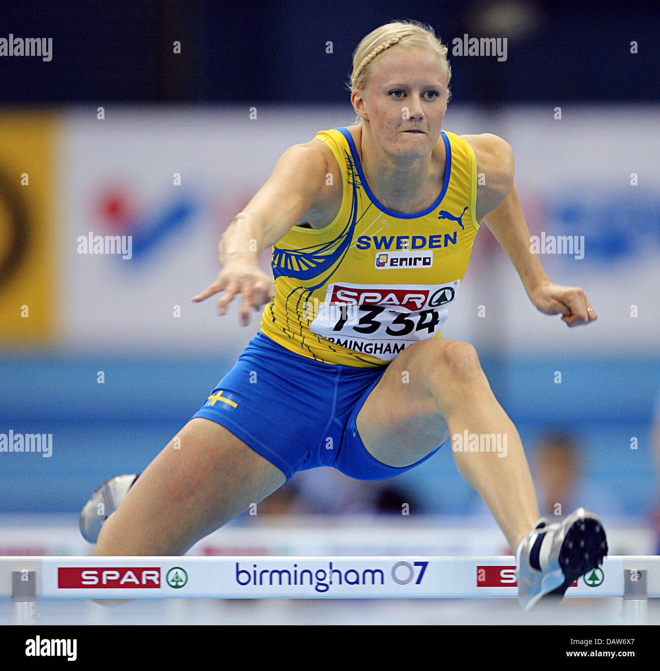 Swedish pentathlete Caronia Klueft takes a hurdle at the Pentathlon ...