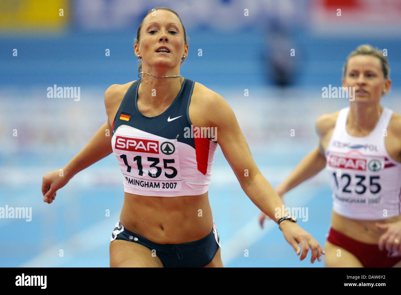 German athlete Kirsten Bolm (L) crosses the finish line third placed at ...