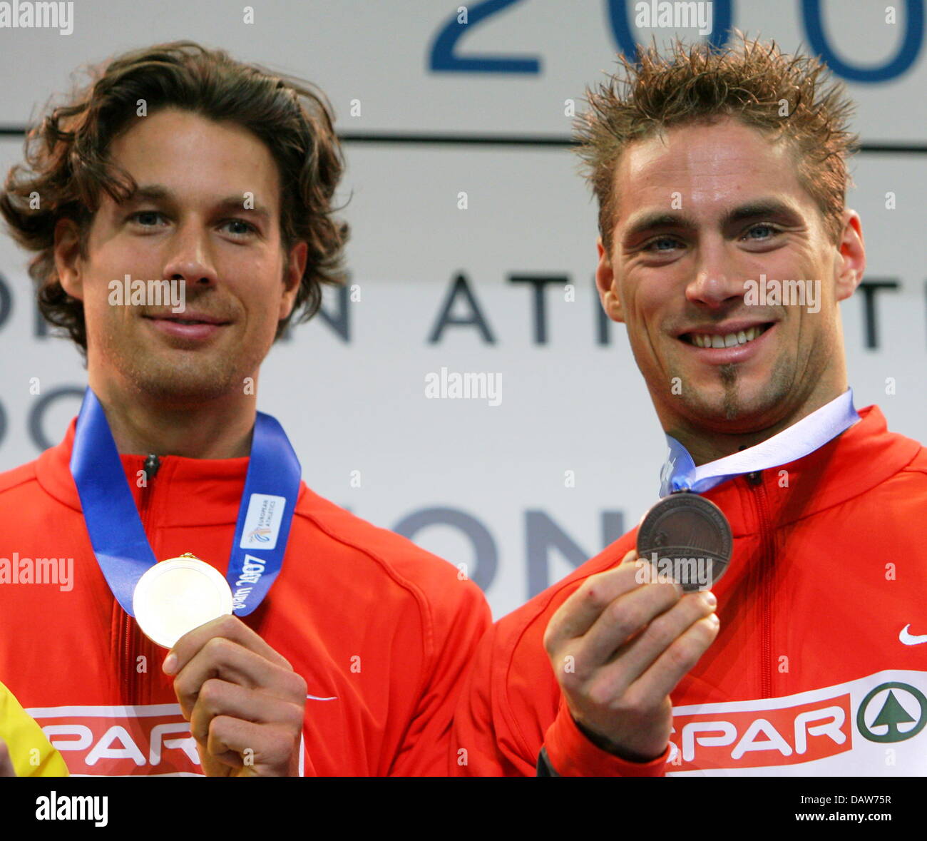 German pole vaulters Bjoern Otto (R) and Danny Ecker (L) present their ...