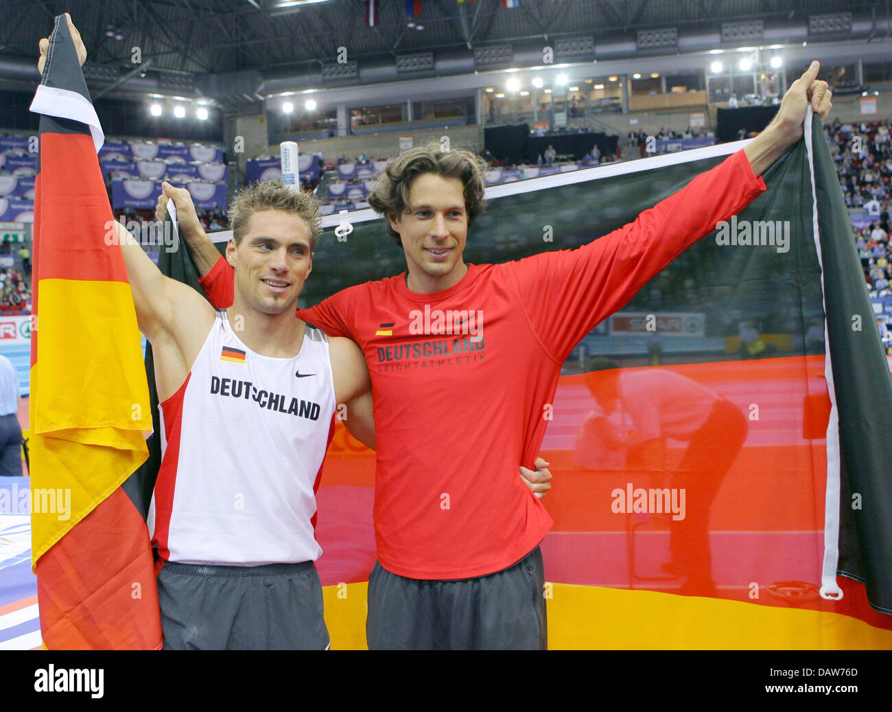 German pole vaulter Danny Ecker (R) cheers with fellow countryman ...
