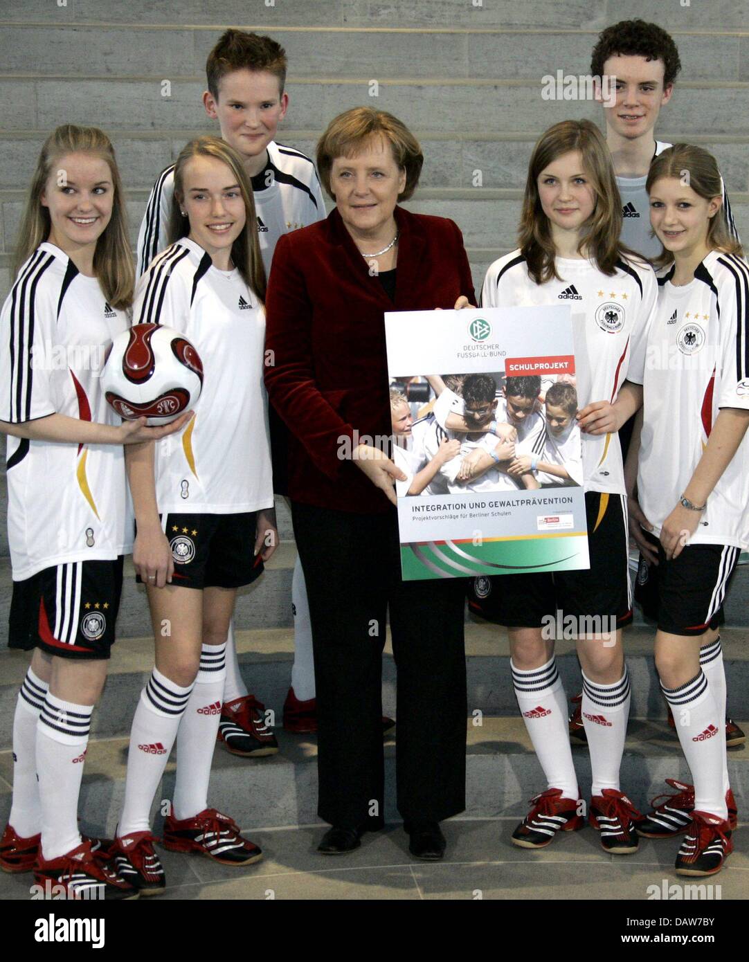 German Chancellor Angela Merkel is pictured with pupils of the Hannah ...
