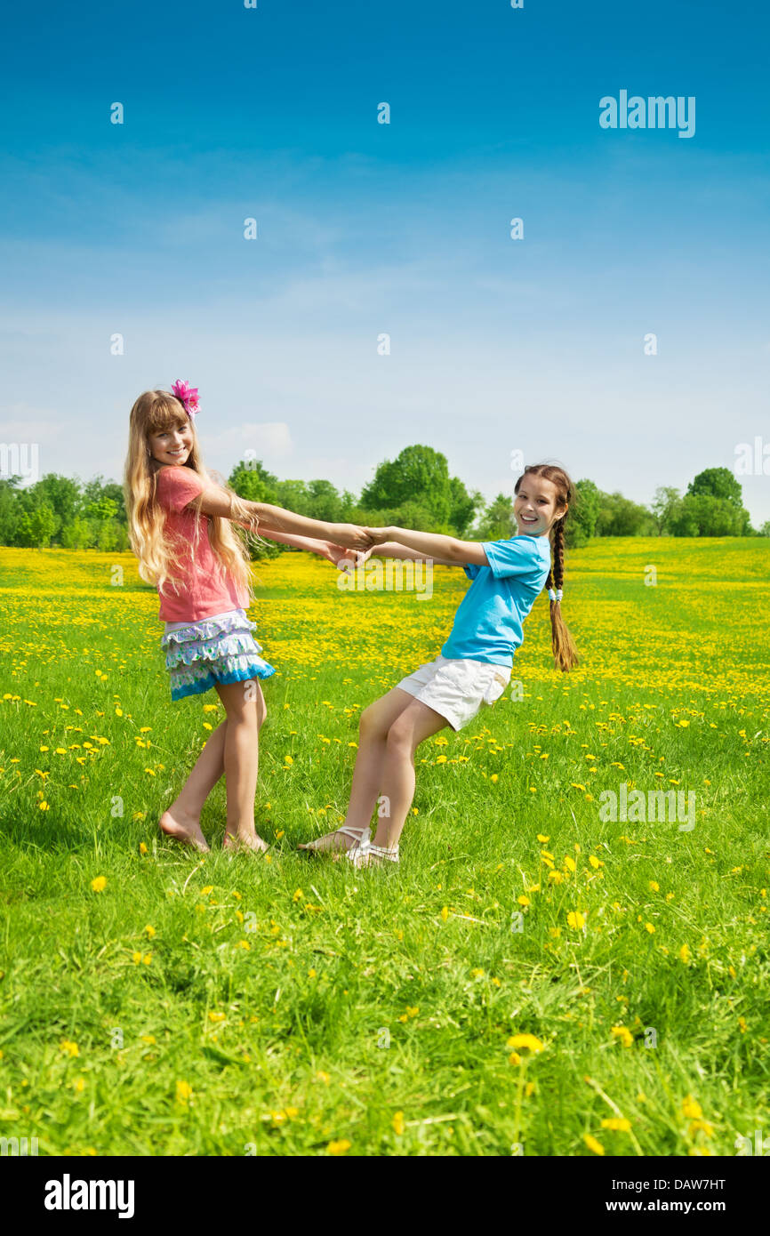 Two girls dancing together hi-res stock photography and images - Alamy