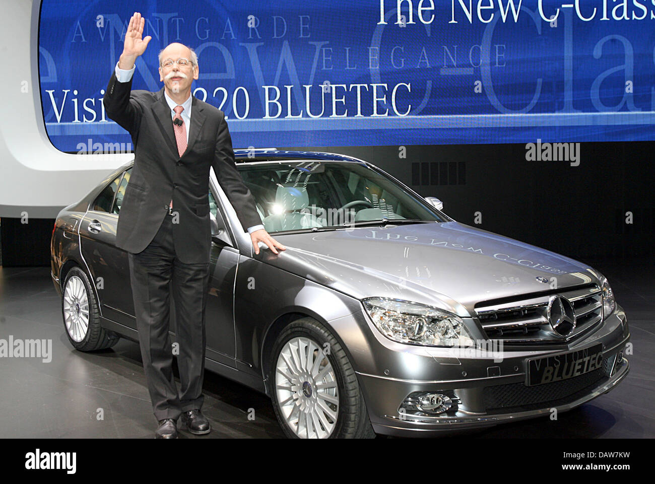 Dieter Zetsche, DaimlerChrysler CEO poses in front of a Mercedes C ...