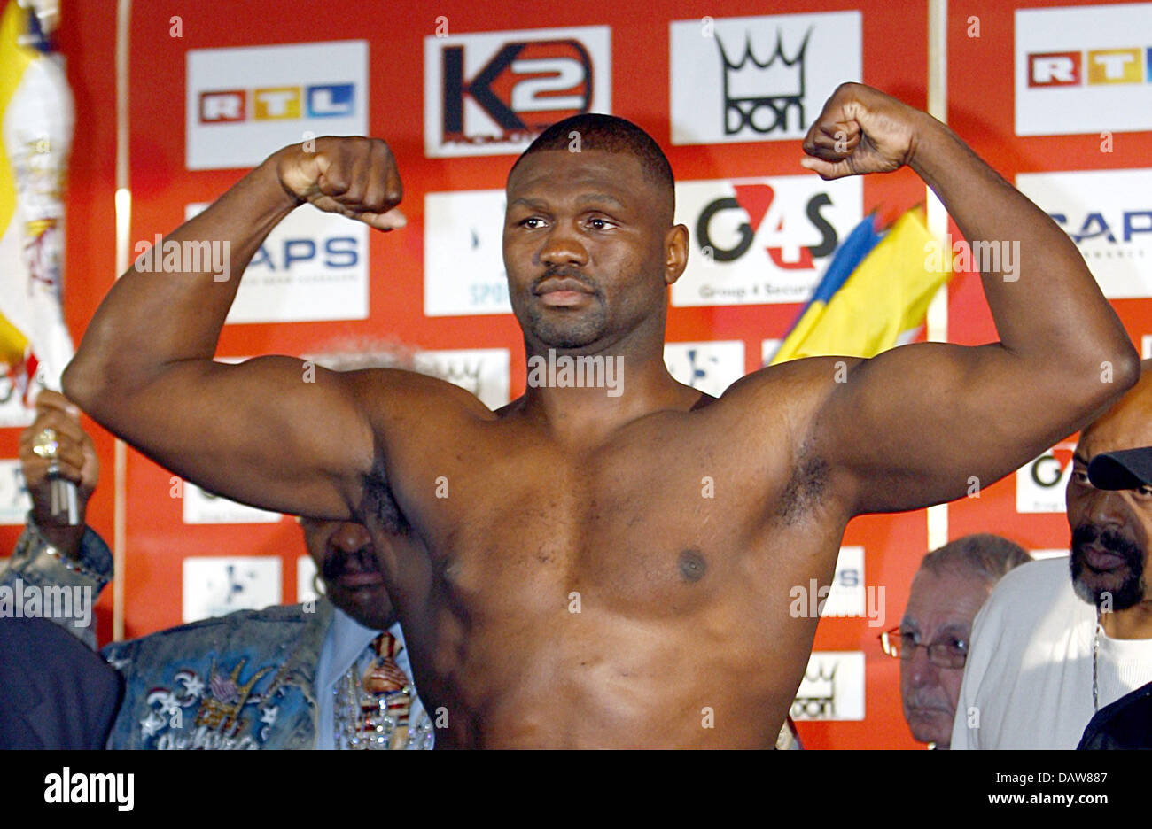 US boxing pro Ray Austin shows his muscles at the official weighing in ...
