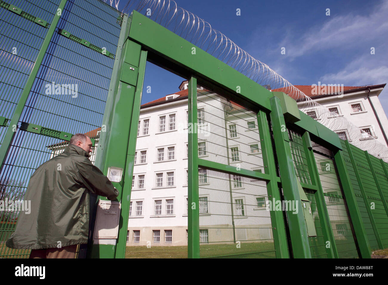 A prison officer opens a gate of the correctional facility Aichach ...