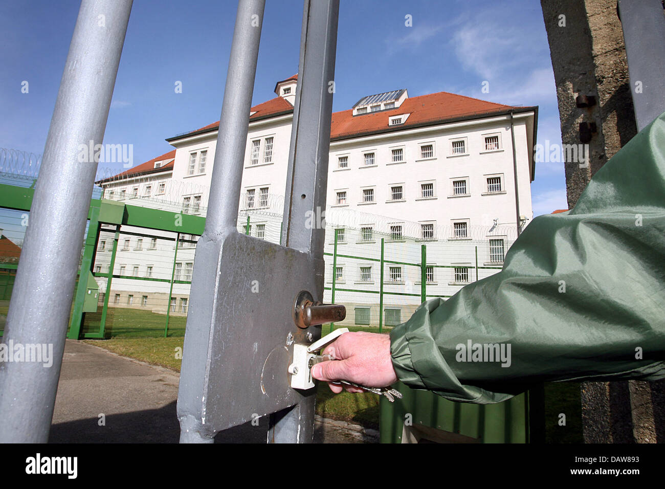 A prison officer opens a gate of the correctional facility Aichach ...