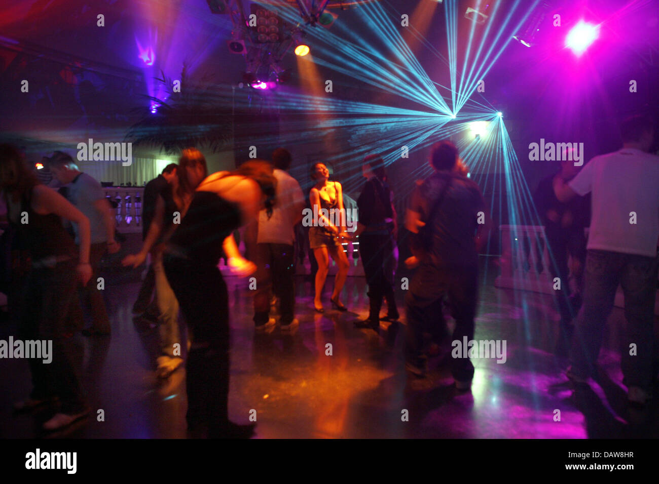 Visitors are pictured dancing in a discotheque in Moisburg, Germany ...