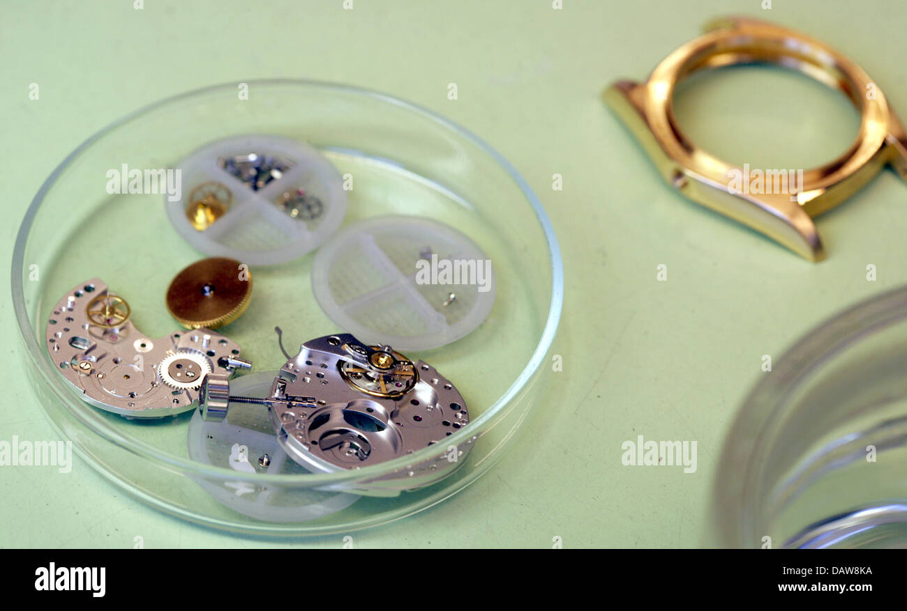 The picture shows parts of a Rolex luxury wrist watch at the workshop ...