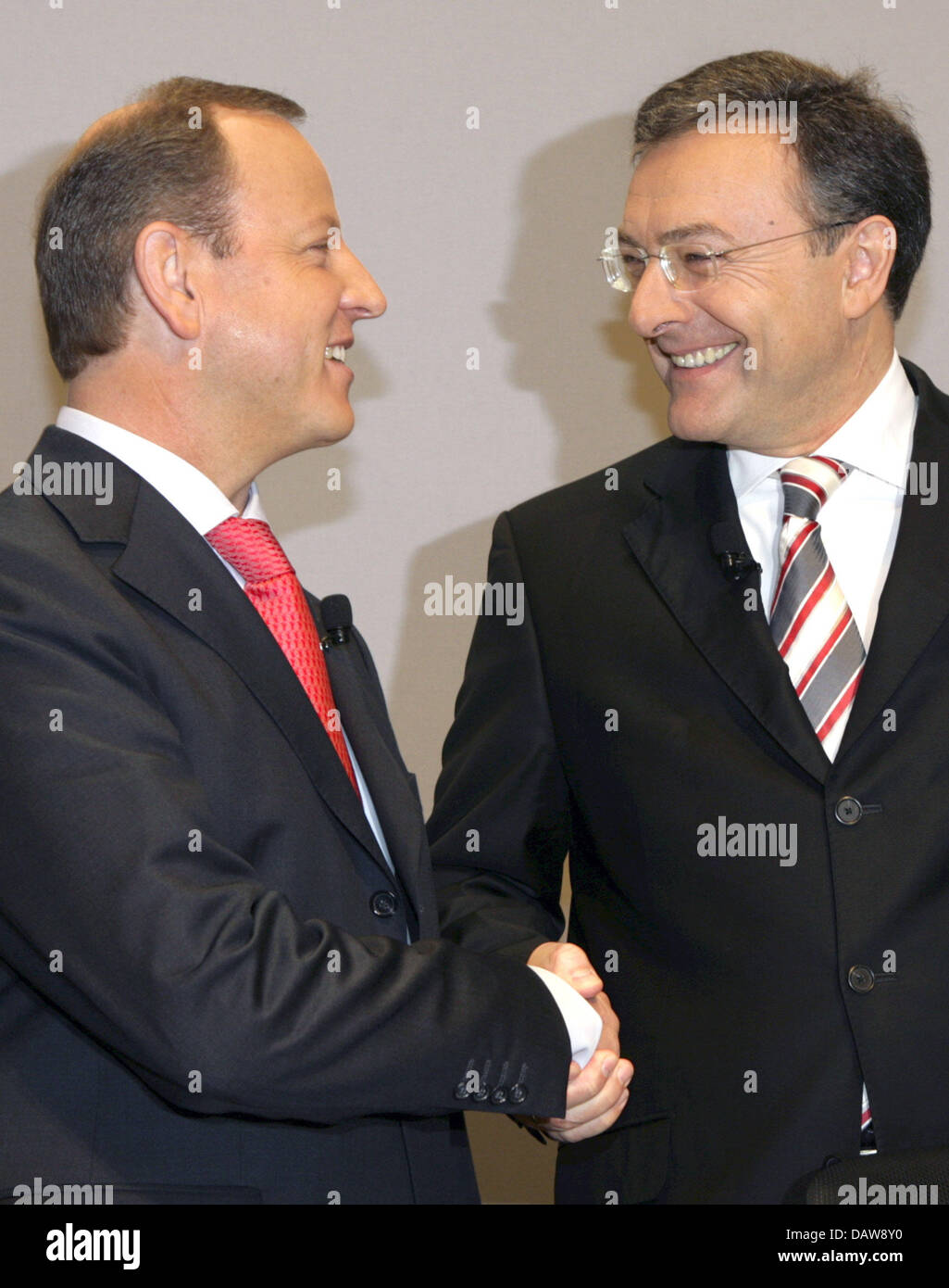 BMW CEO Norbert Reithofer (R) and BMW CFO Stefan Krause are pictured at ...