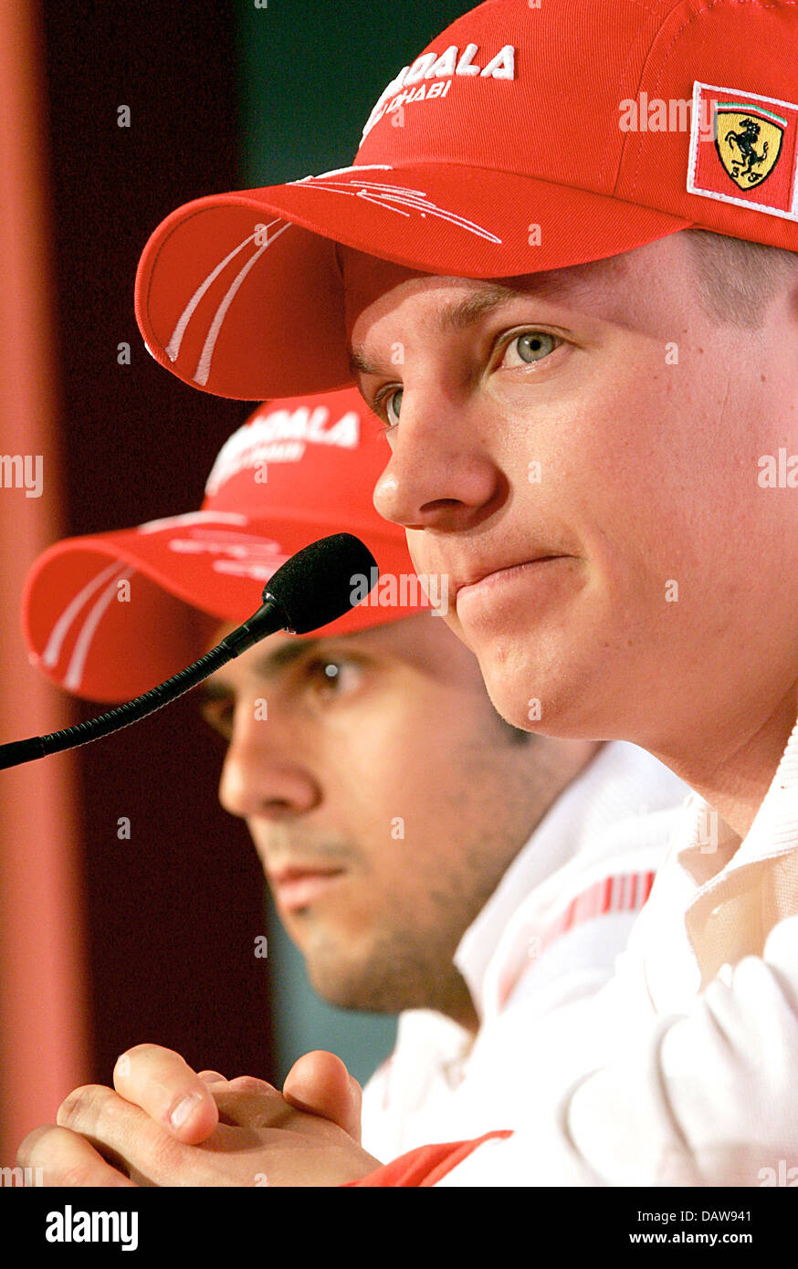 Brazilian Formula 1 pilot Felipe Massa (L) and his teammate Finnish ...