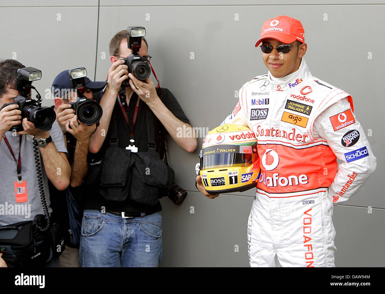 British Formula One rookie Lewis Hamilton (R) of McLaren Mercedes poses ...