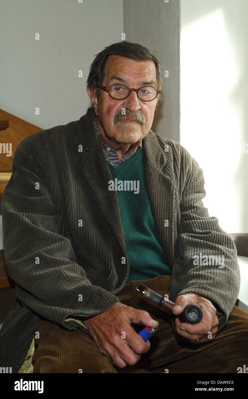 Laureate of the Nobel Prize in Literature Guenter Grass sits near a ...