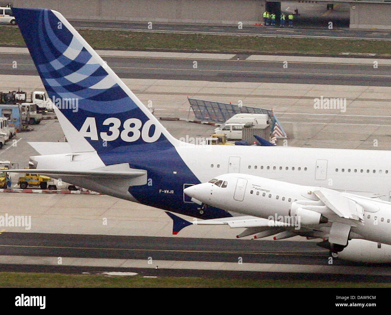 The new wide-bodied aircraft Super-Airbus A380 overtowers the starting ...
