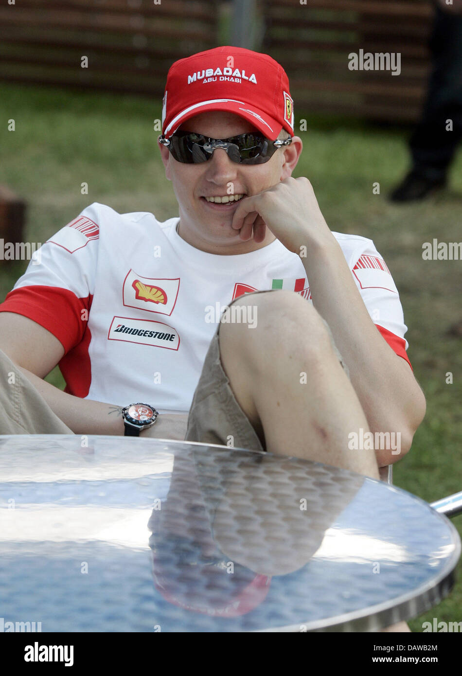 Finnish Formula One pilot Kimi Raikkonen of Scuderia Ferrari smiles in ...