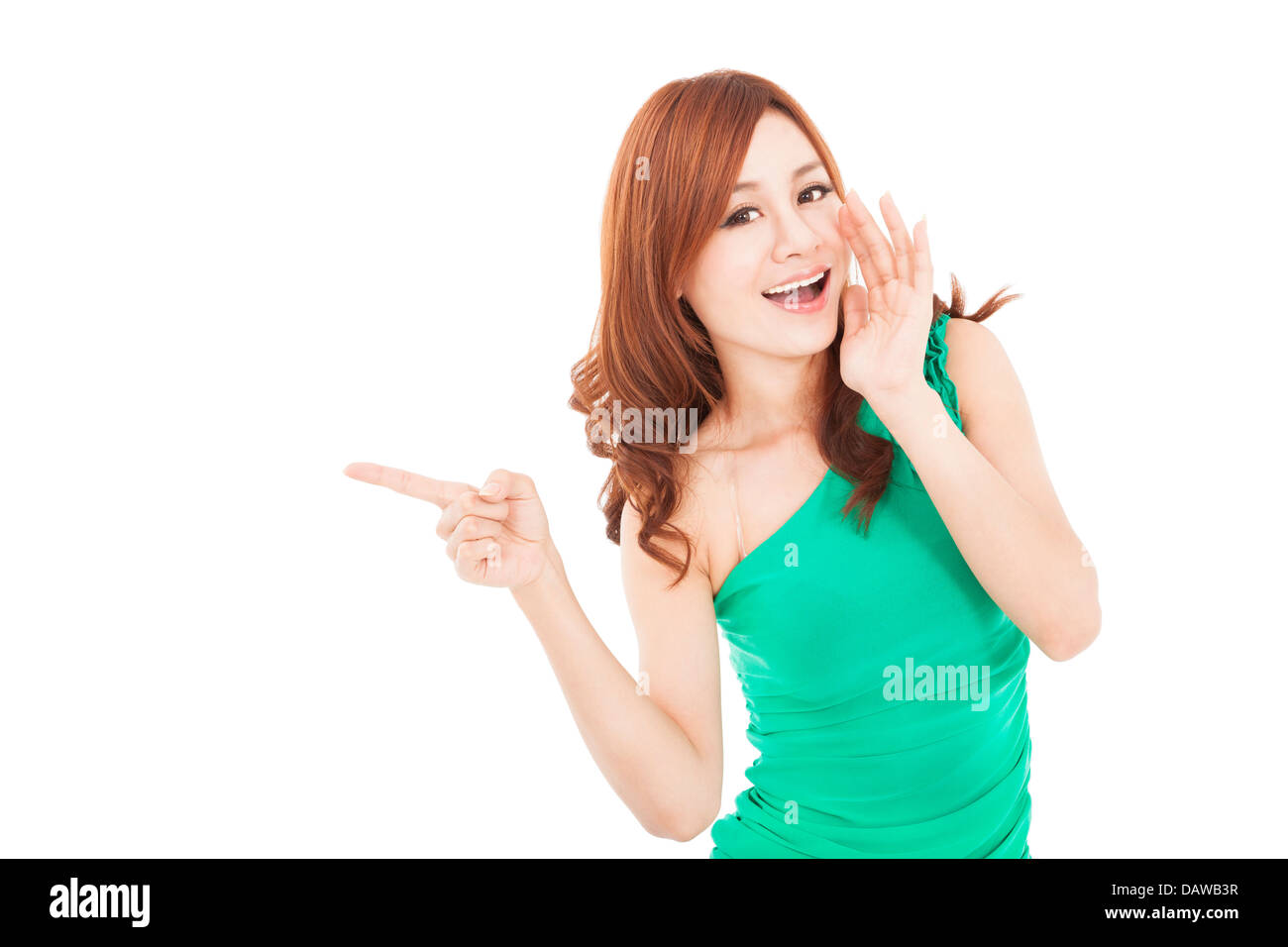 smiling asian young woman shouting and pointing Stock Photo - Alamy