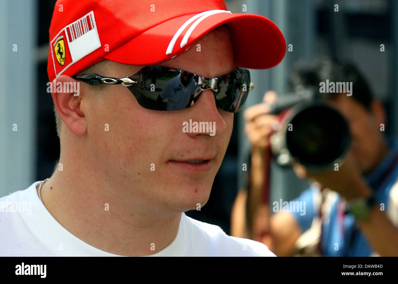 Finnish Formula One pilot Kimi Raikkonen of Scuderia Ferrari smiles in ...