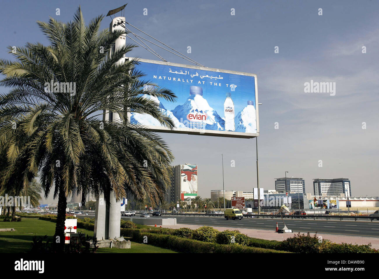 A huge billboard advertises Evian mineral water along the Sheik Zayed ...