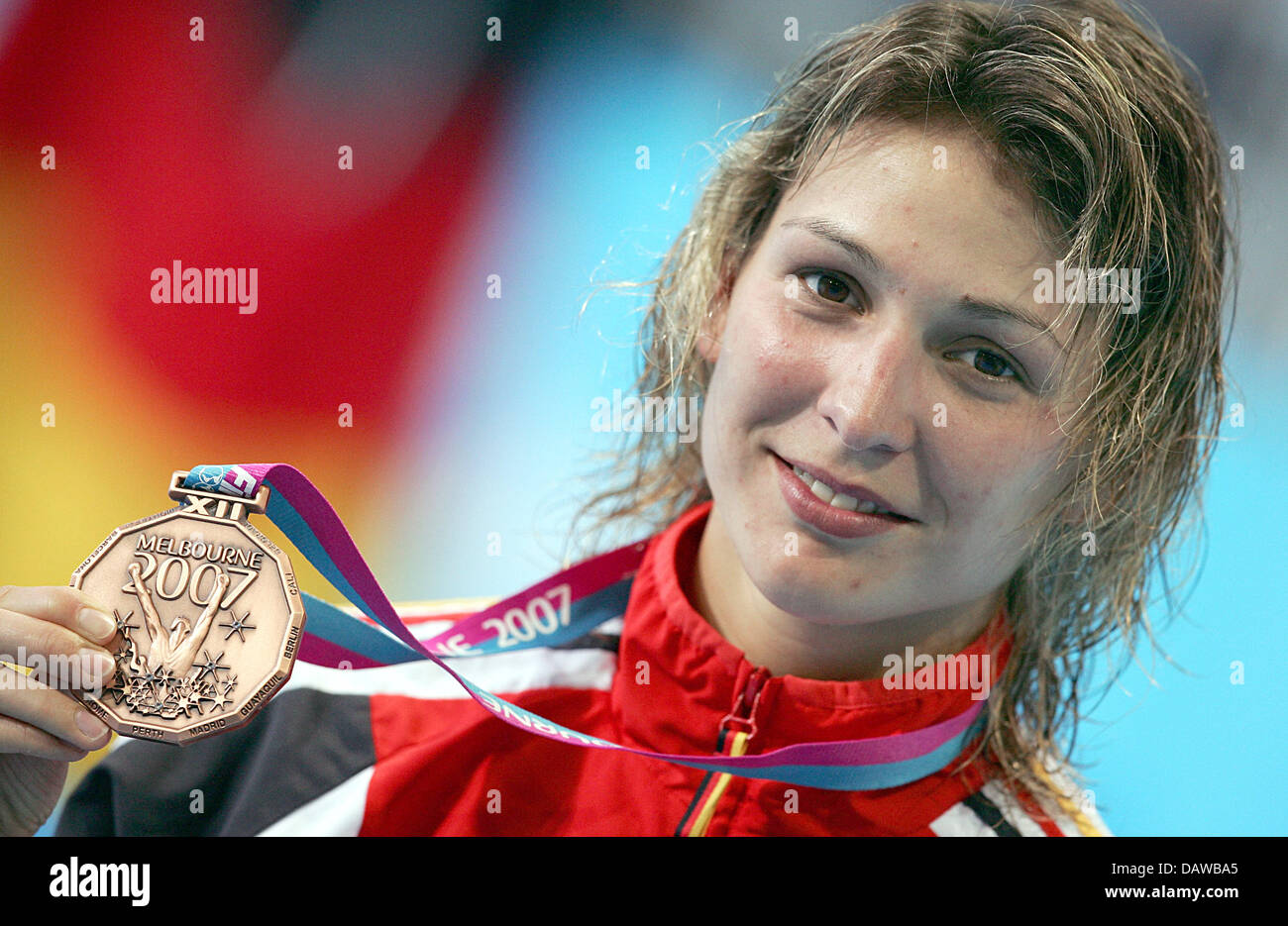 German diver Christin Steuer poses with her bronze medal after the ...