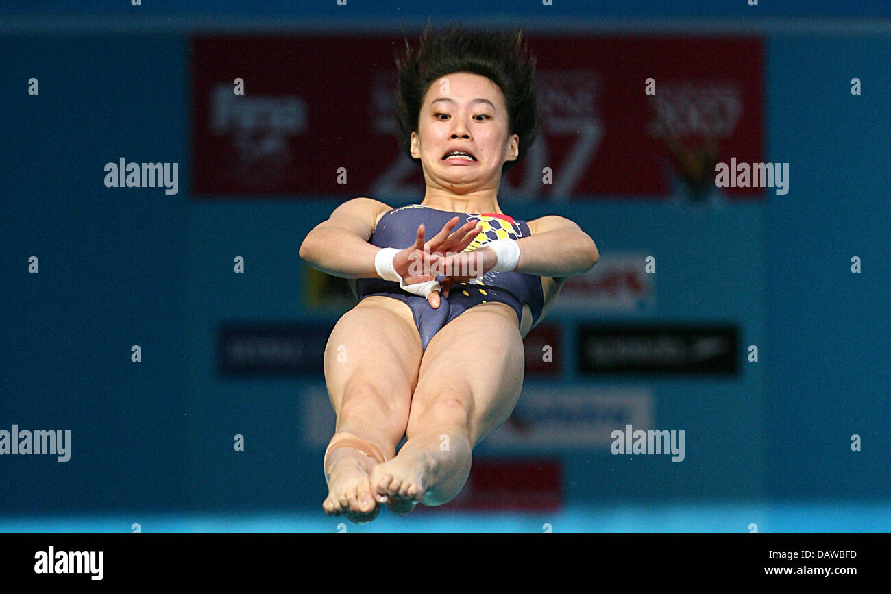 Chinese Ting Li pictured during one attempt of the 1m springboard at ...