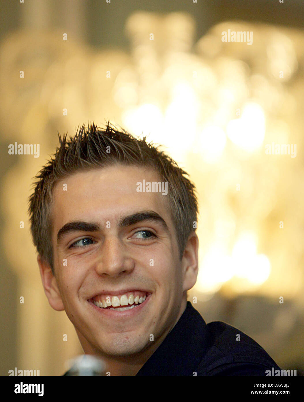 German international Philipp Lahm smiles during a press conference of ...