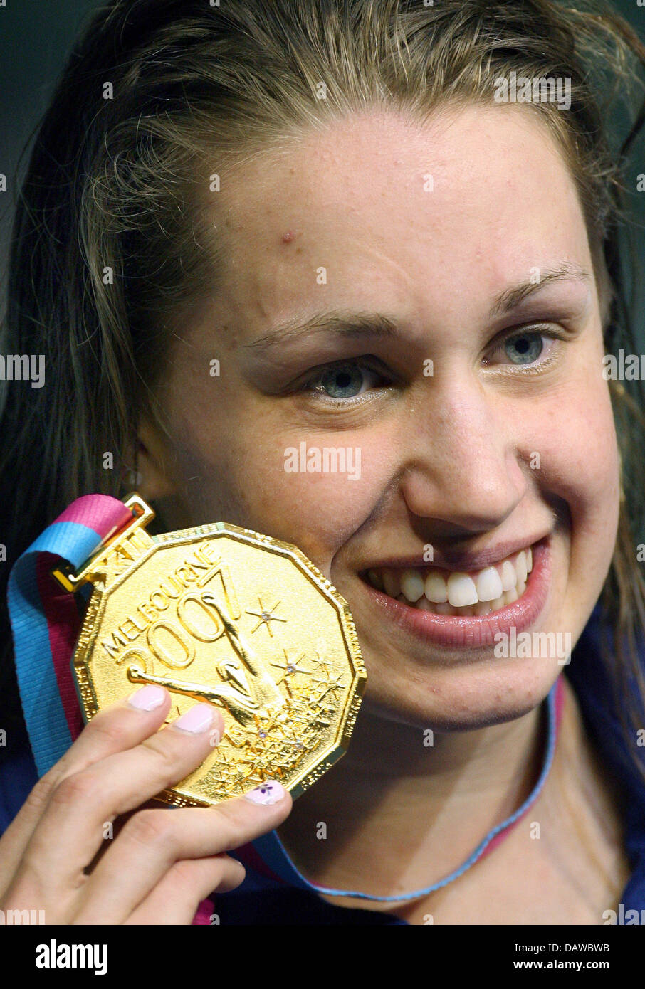 US American swimmer Kathryn Hoff shows her gold medal after winning the ...