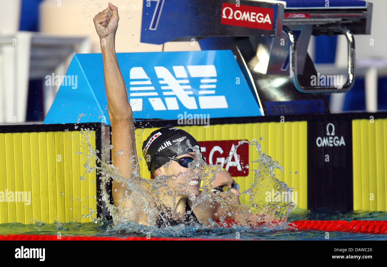 US swimmer Natalie Coughlin cheers winning the Women's 100m Backstroke ...