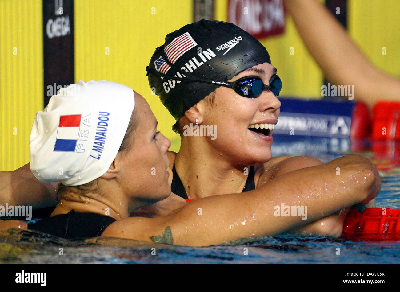 US swimmer Natalie Coughlin (R) cheers winning ahead of French Laure ...