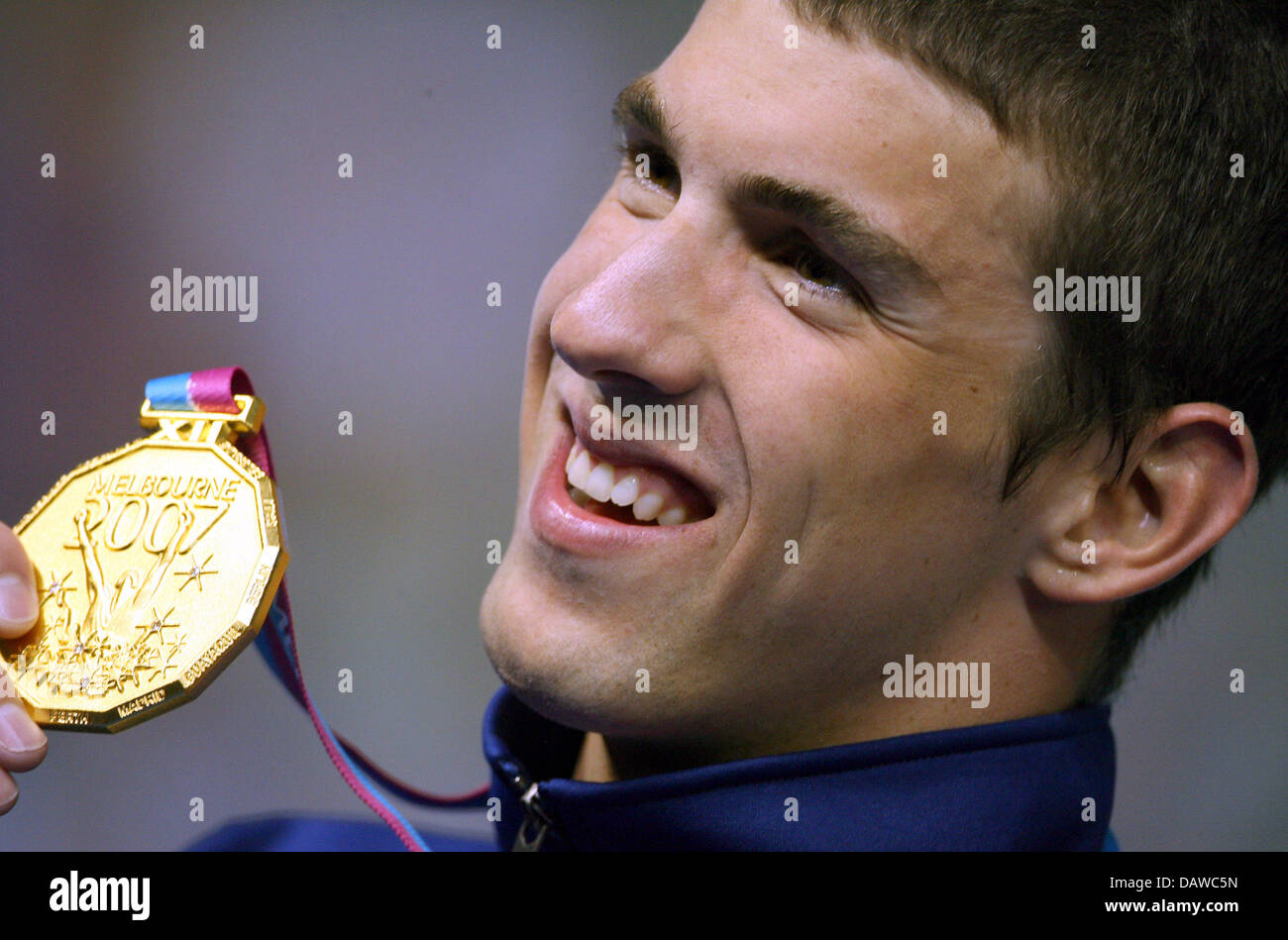 US American swimmer Michael Phelps poses and smiles with his 200m ...