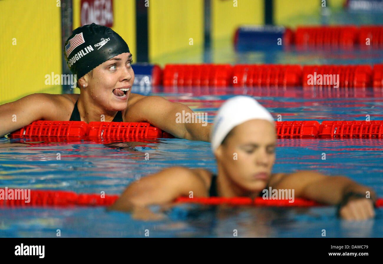 US swimmer Natalie Coughlin (L) cheers winning ahead of French Laure ...