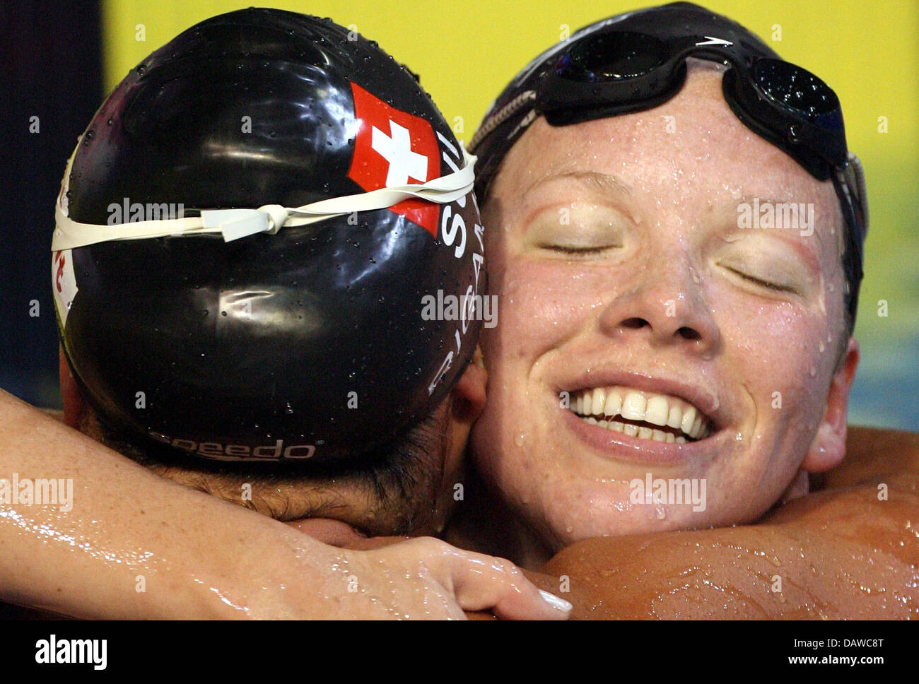 US swimmer Kate Ziegler (R) cheers winning ahead of Swiss Flavia ...