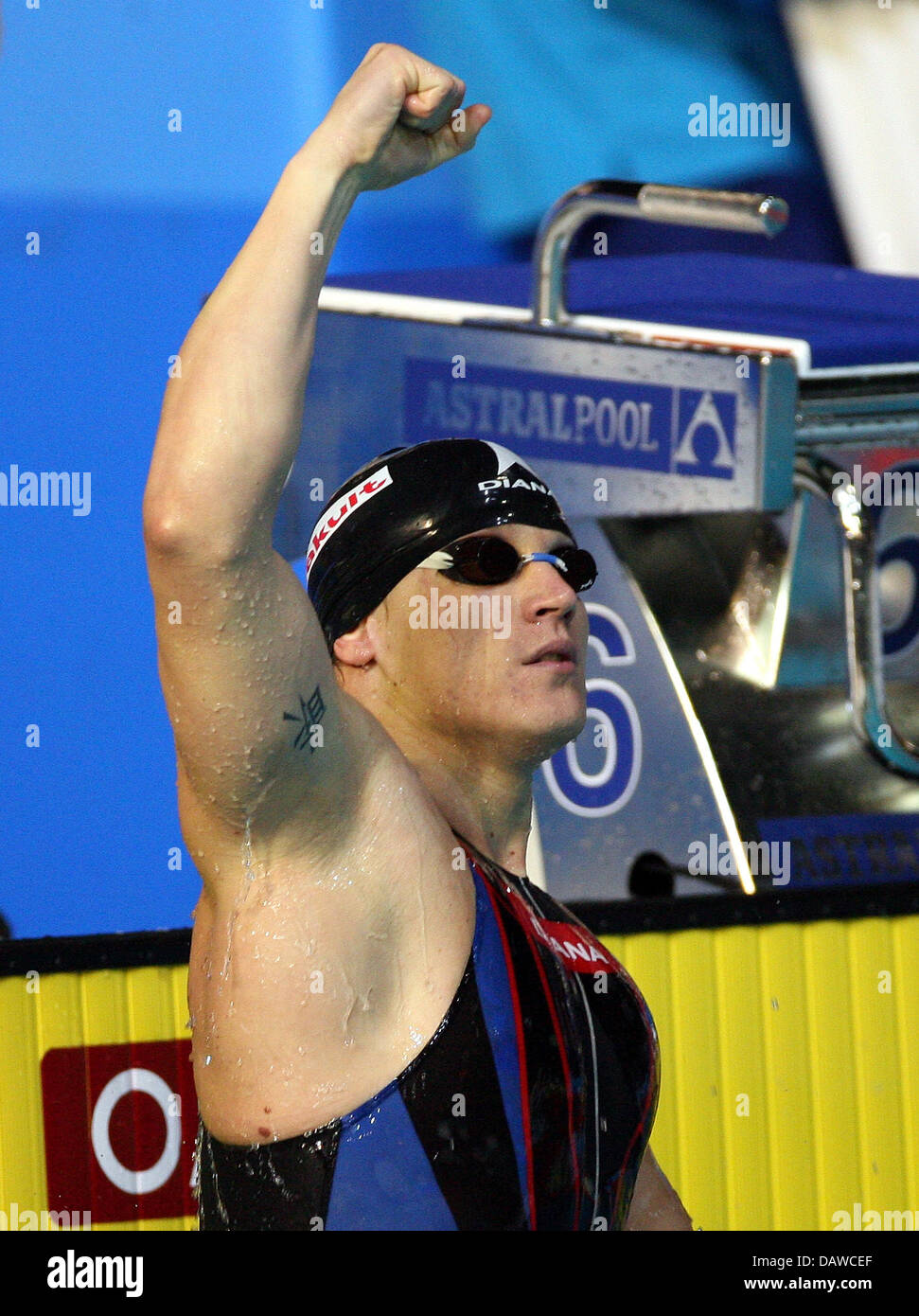 Ukrainian swimmer Oleg Lisogor cheers after winning the men's 50m ...