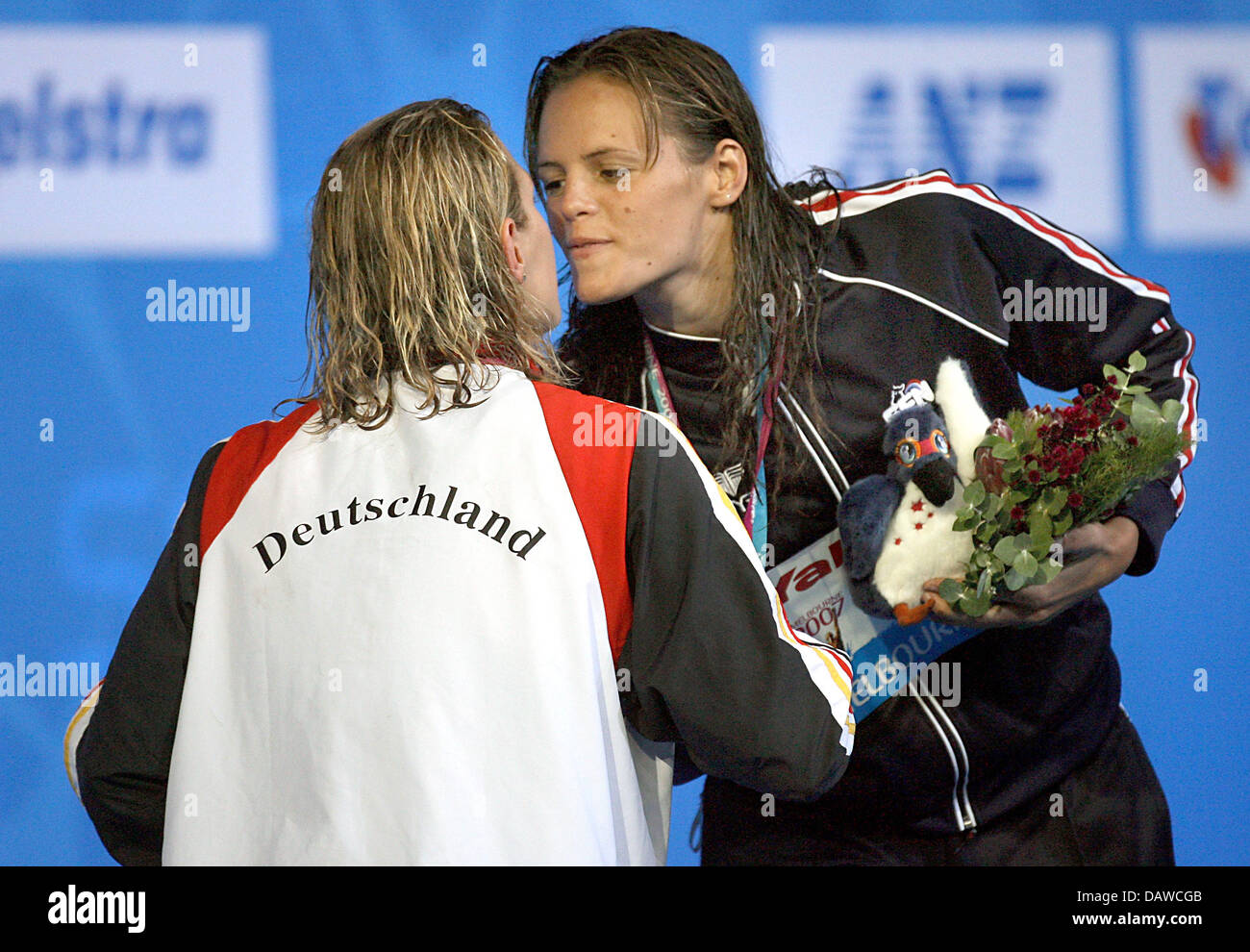 French winner Laure Manaudou (R) and German second placed Annika Lurz ...