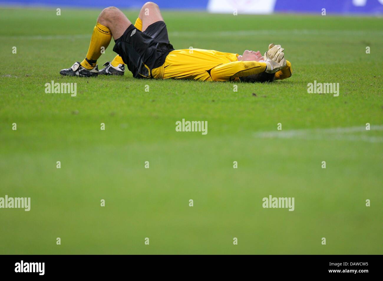 Norwegian goalie Thomas Myhre lies disappointed on the ground after ...