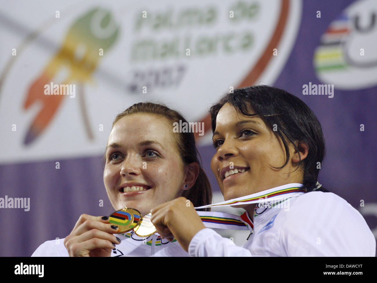 British cycling pros Victoria Pendleton (L) and Shanaze Reade (R) cheer ...