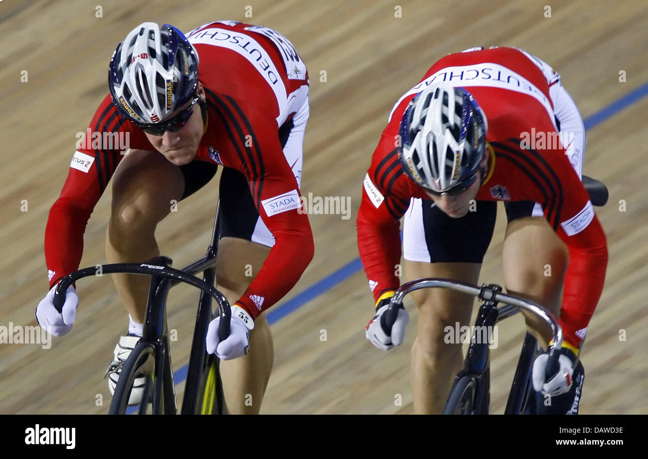 German cycling pro Stefan Nimke (R) is overtaken by German Maximilian ...