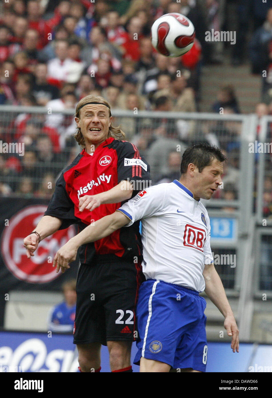 Marco Engelhardt (L) of Nuremberg and Berlin's Pal Dardai play a ...