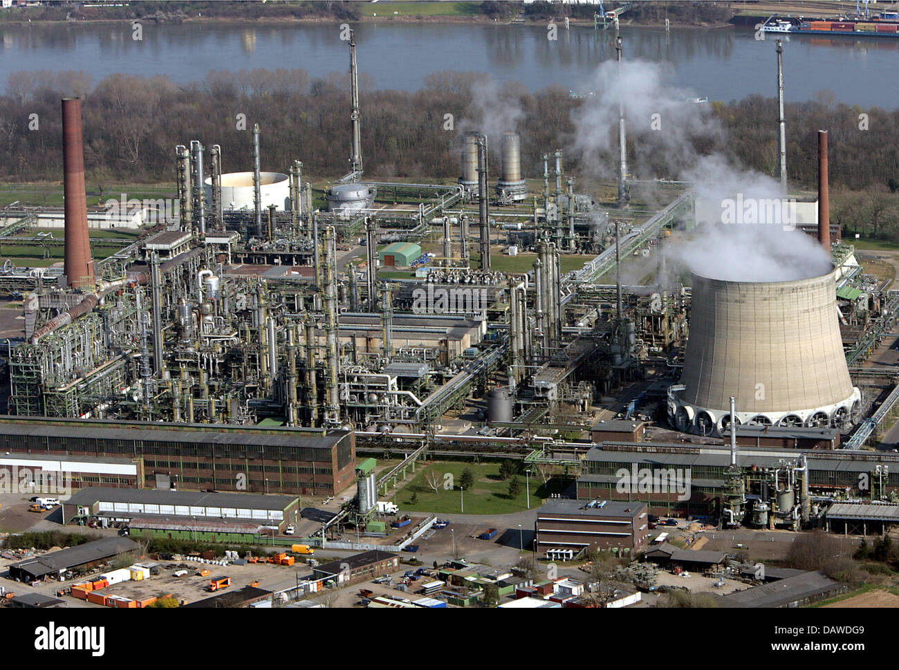 Huge oil tanks are pictured on the premises of the Shell refinery in ...