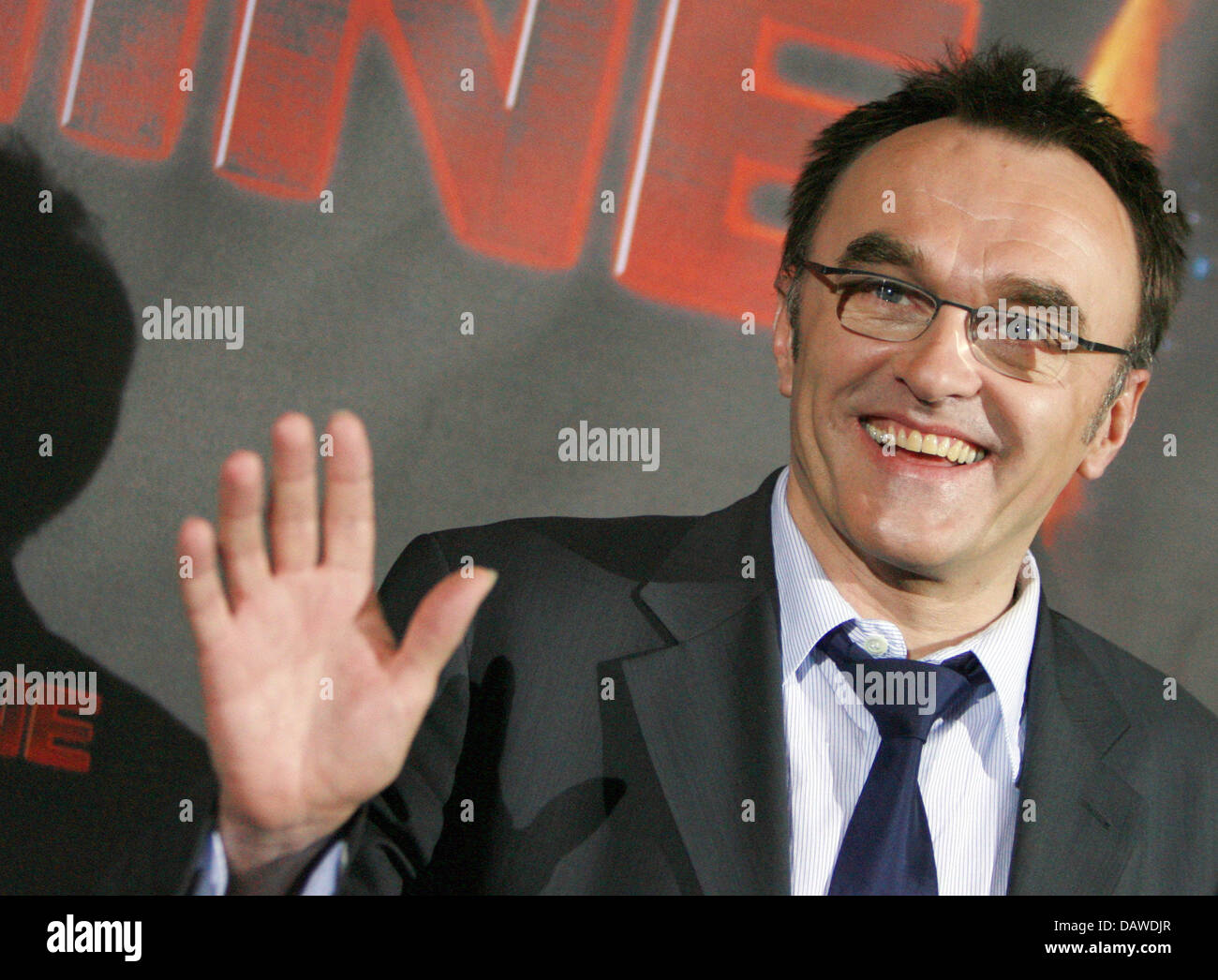 British director Danny Boyle waves at a photo call to the presentation ...