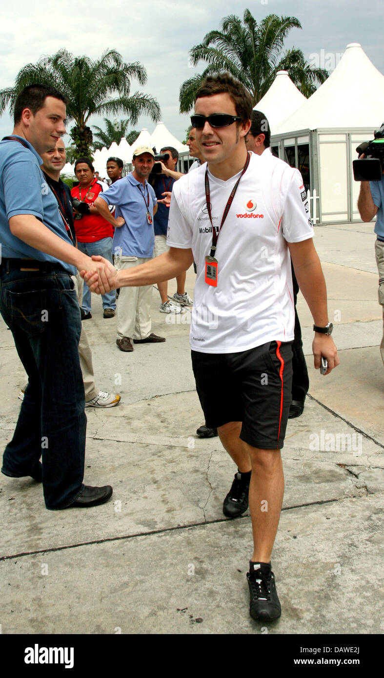 Spanish Formula 1 driver Fernando Alonso of McLaren Mercedes arrives to ...