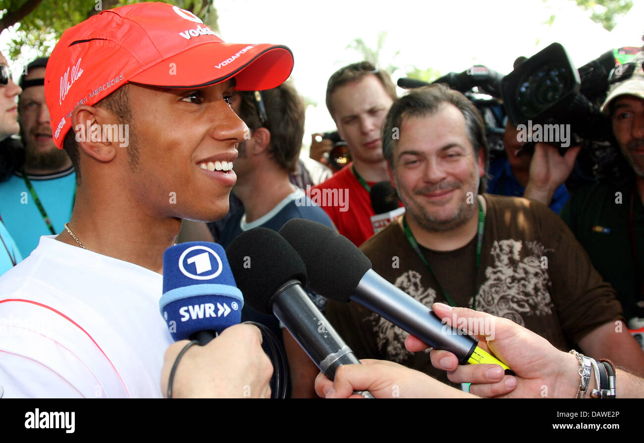 British Formula One driver Lewis Hamilton of McLaren Mercedes gices ...